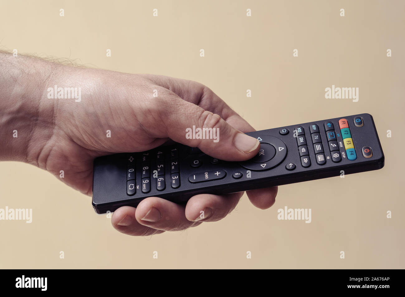 Remote control television advertisement hi-res stock photography and ...