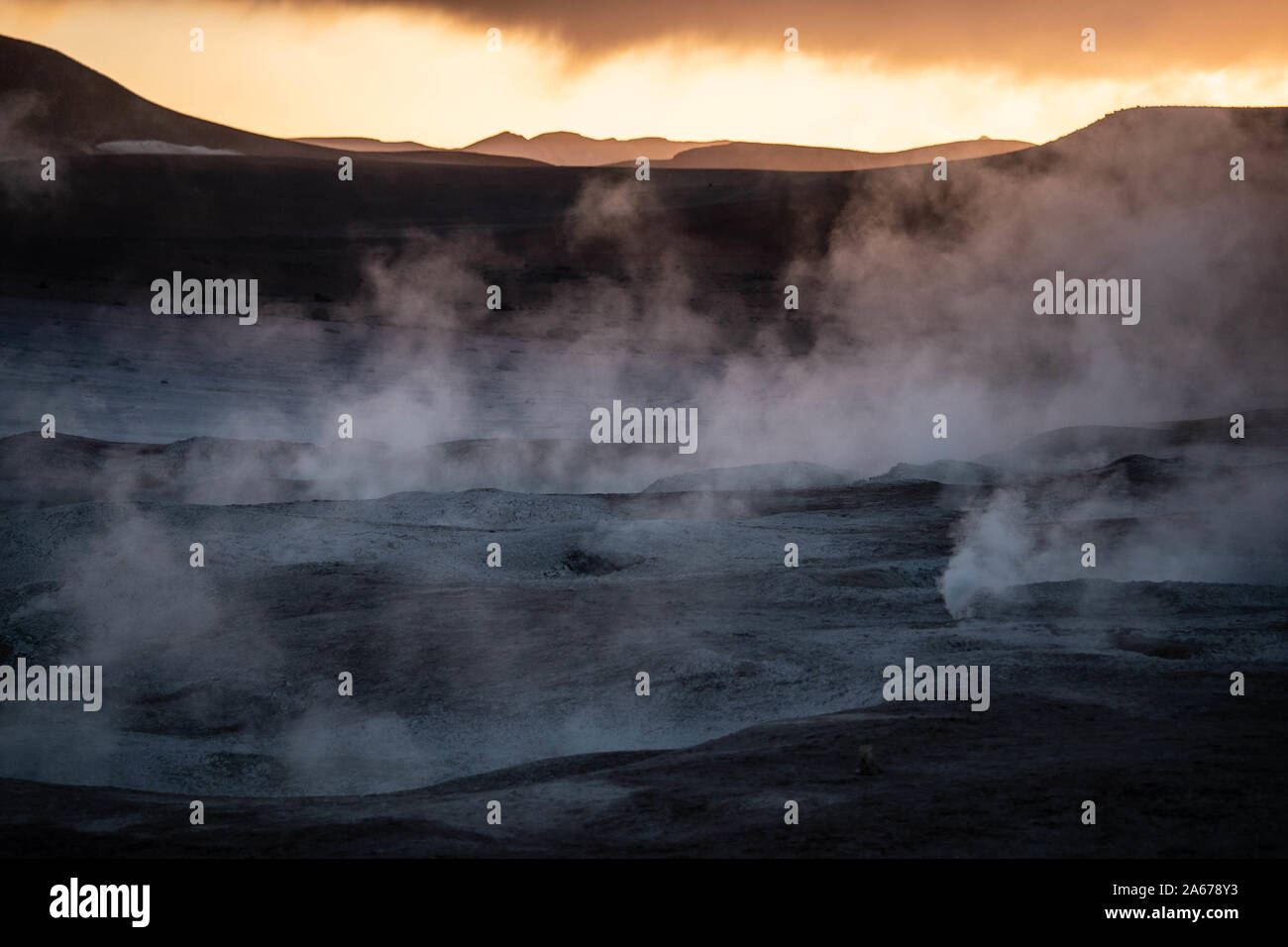 Geyser on geothermal landscape at sunrise, volcanic activity Stock ...