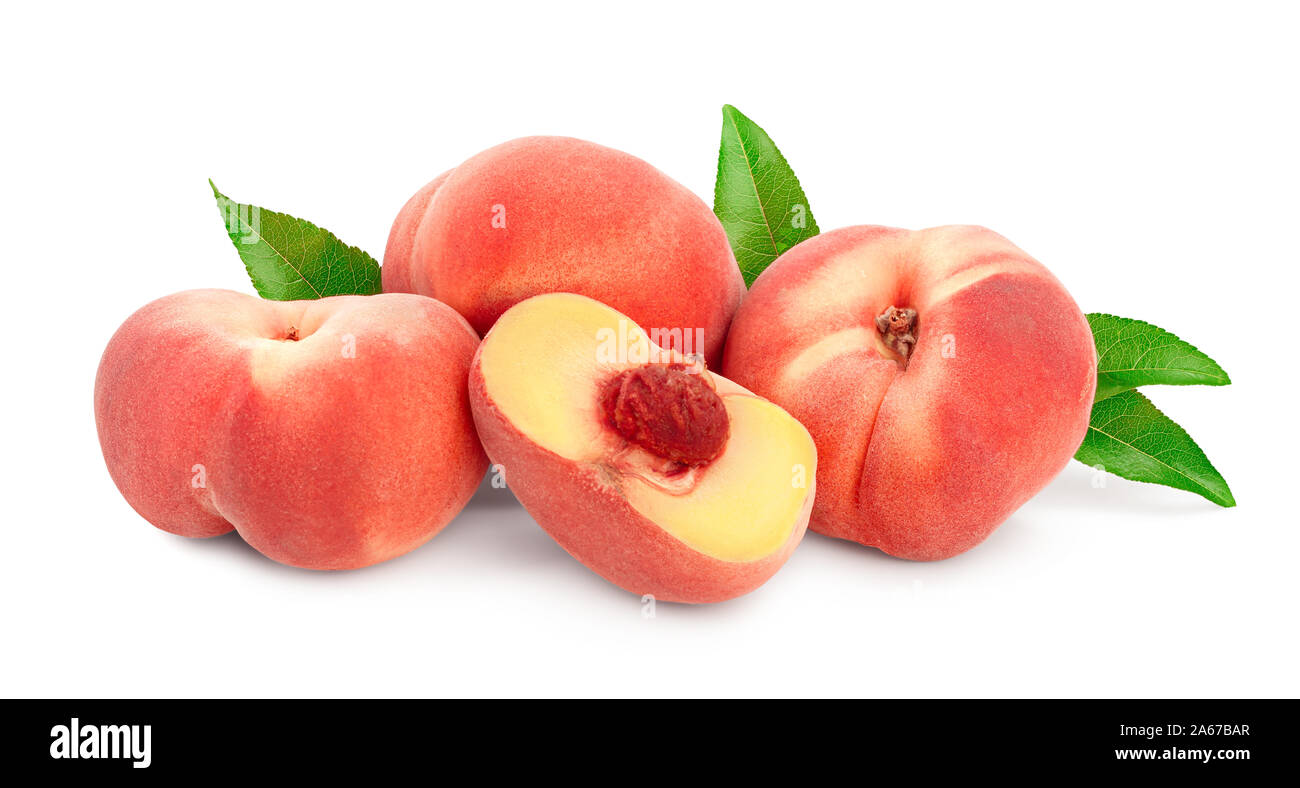 Ripe chinese flat peach fruit and half with leaf isolated on white ...