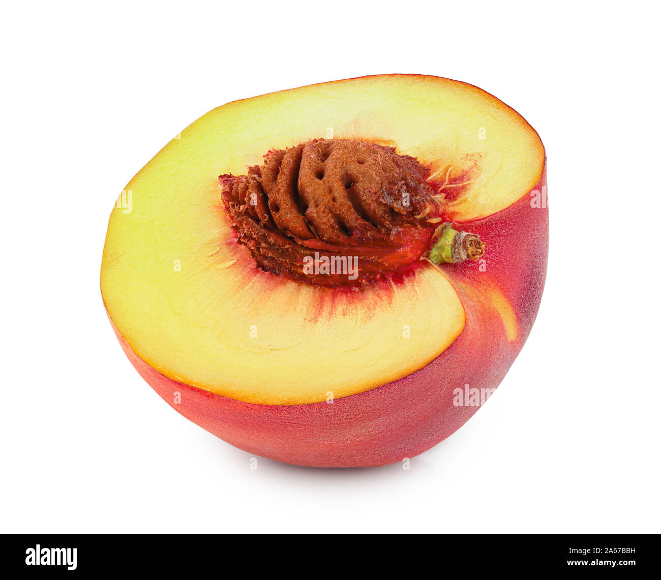 Ripe peach fruit half isolated on white background Stock Photo - Alamy
