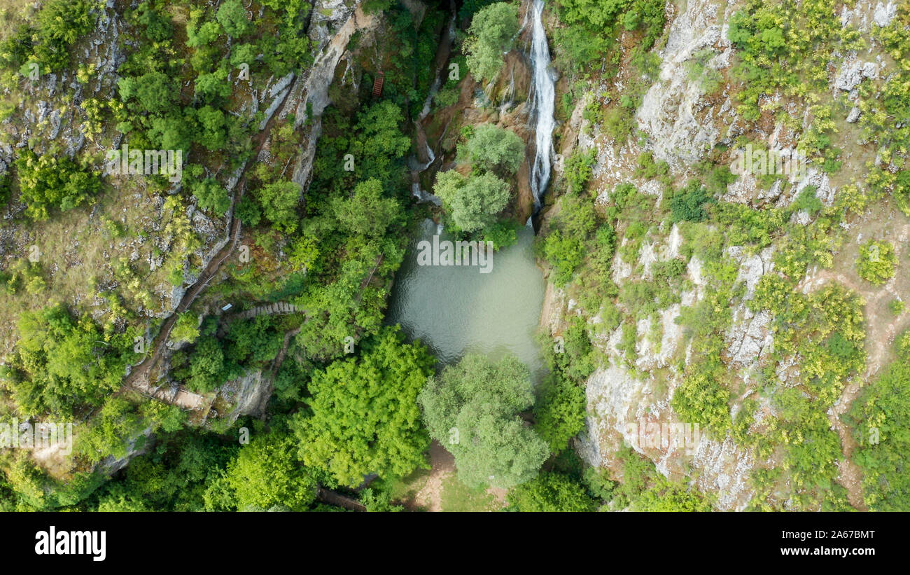 Top view with a valley and waterfall and lots of greenery. Drones ...