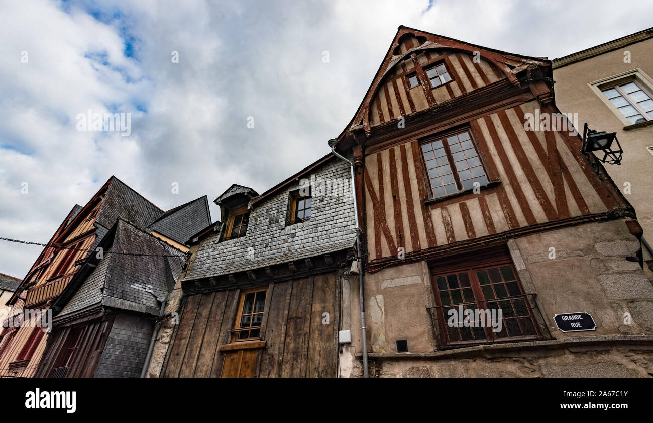 Lokking up at facade view of an old traditional french medieval houses ...