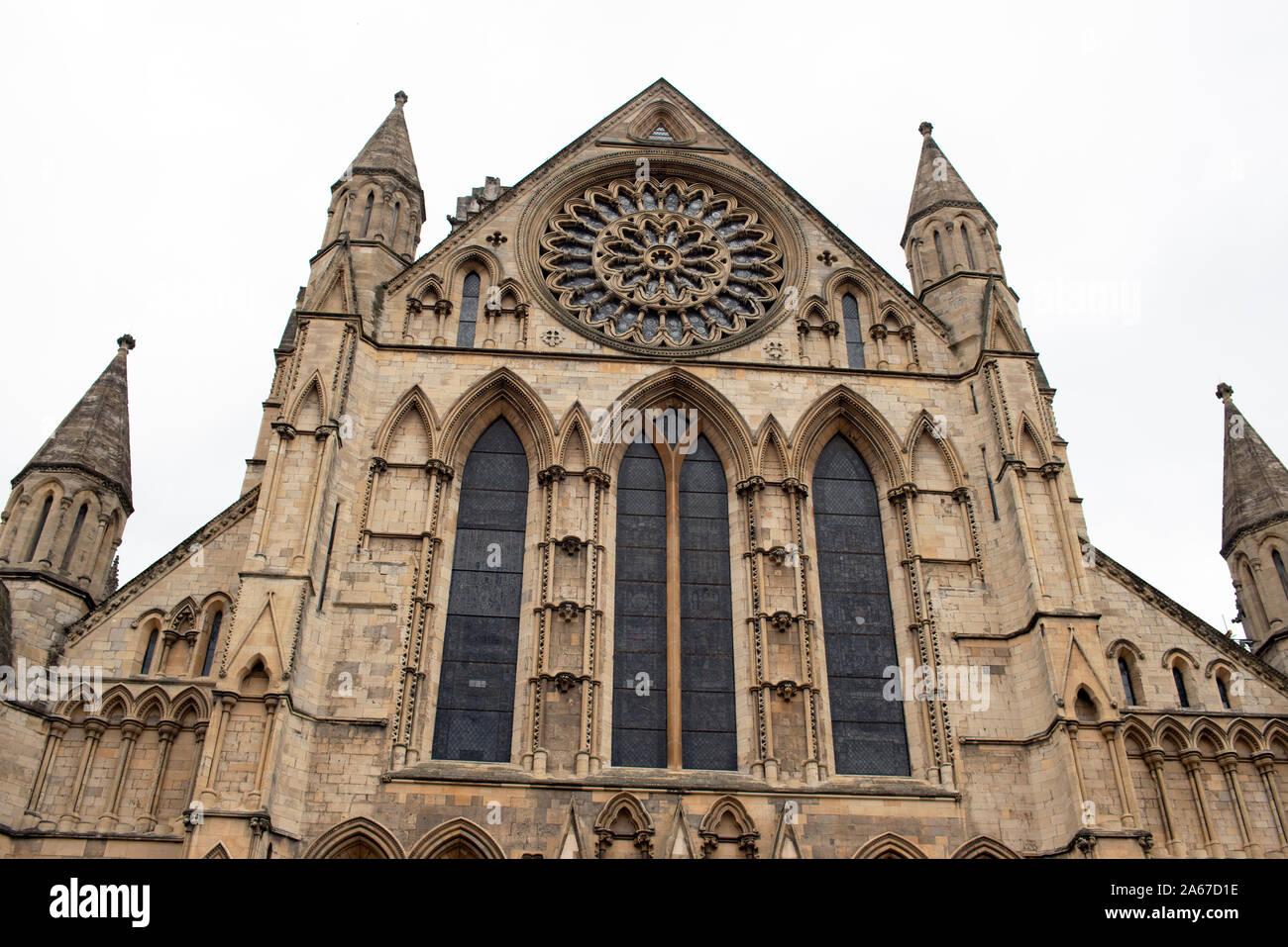 The facade at the main entrance to York Minster with the Rose Window at ...