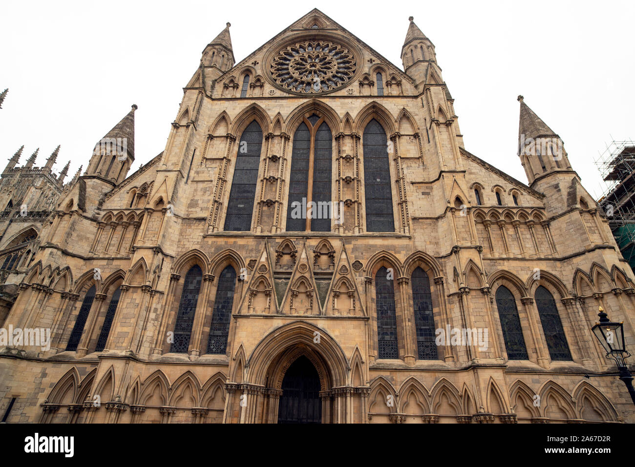 The facade at the main entrance to York Minster with the Rose Window at ...