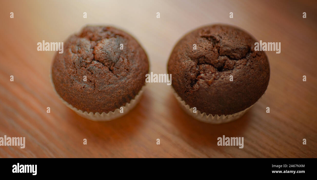 Two chocolate chip muffins hi-res stock photography and images - Alamy