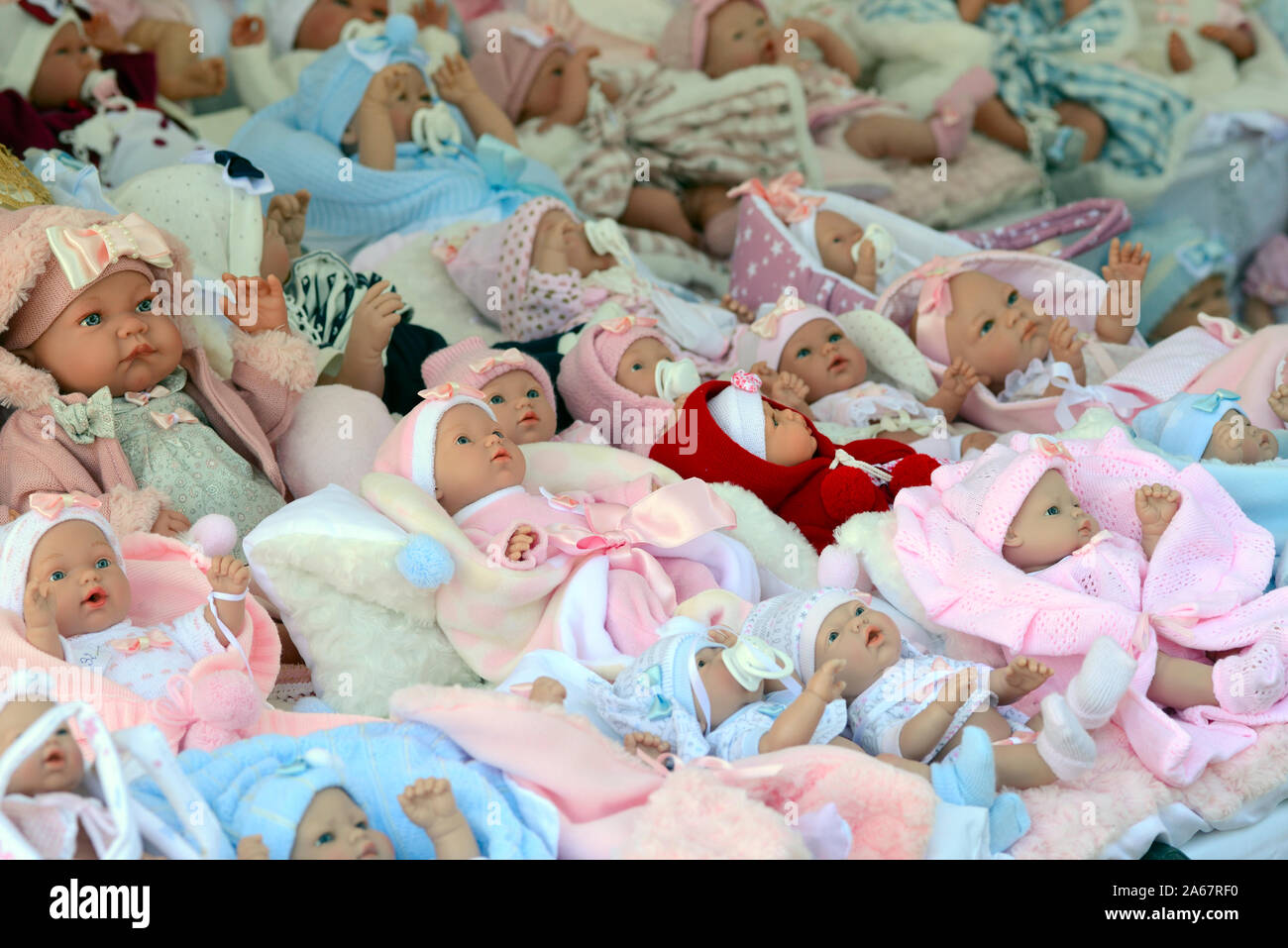 Baby Dolls on Market Stall Stock Photo - Alamy