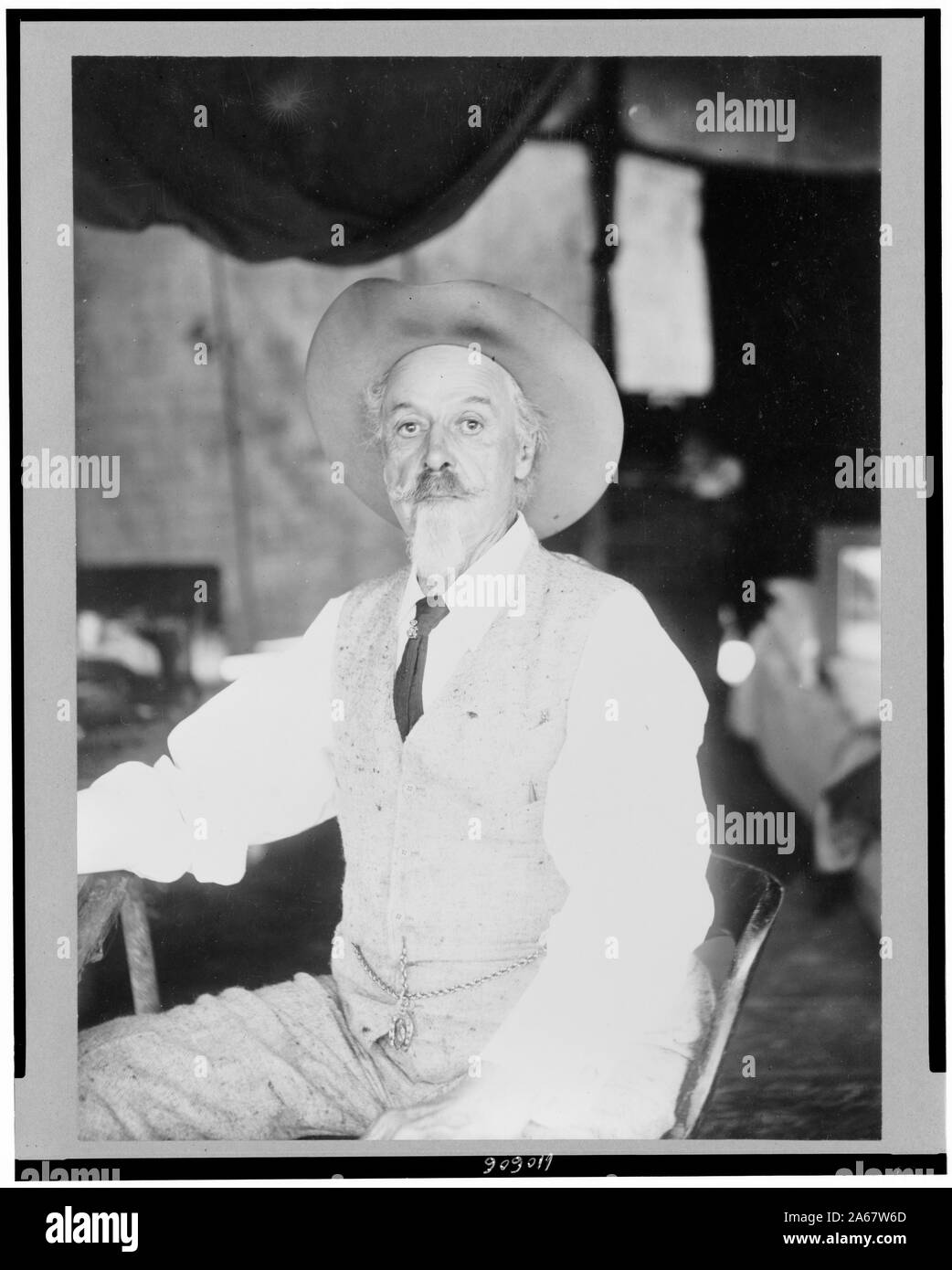 William Frederick Cody, three-quarter length portrait, seated, facing ...