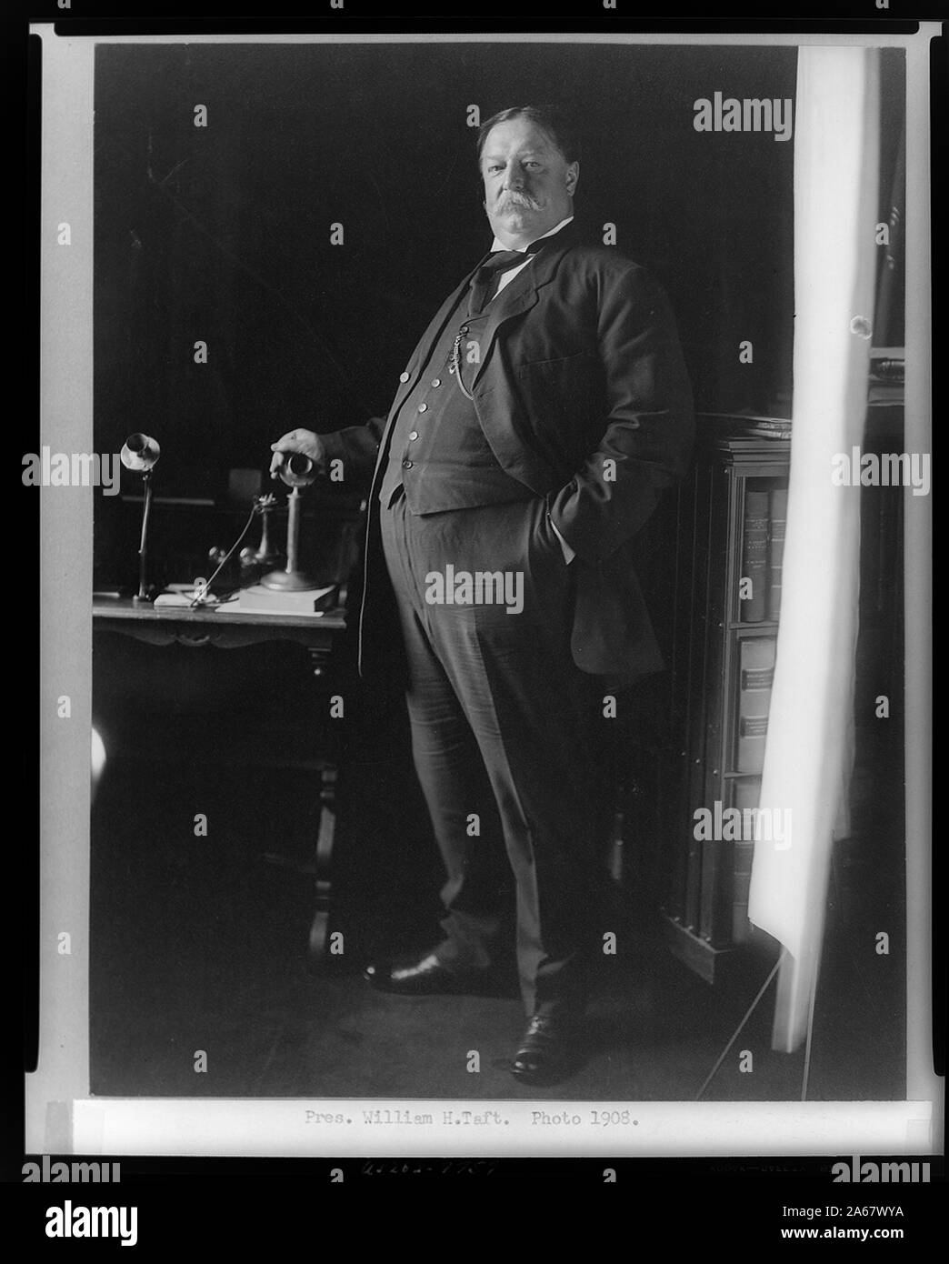 William H. Taft, full-length portrait, standing, facing left, with hand ...