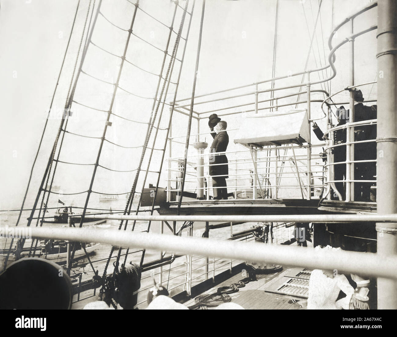 Man waving from deck of boat hi-res stock photography and images - Alamy