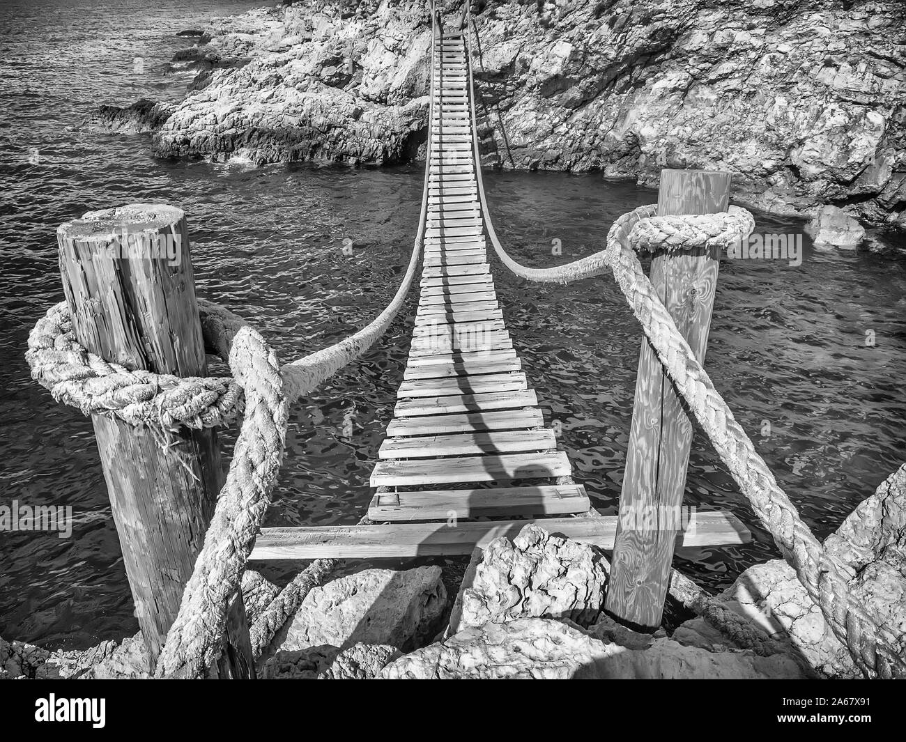 Suspension rope bridge footbridge Black and White Stock Photos & Images ...