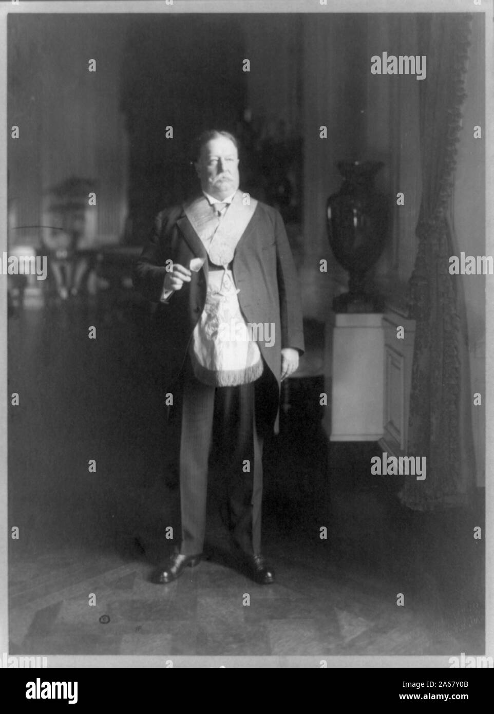William Howard Taft, full-length portrait, standing, facing right, in a ...