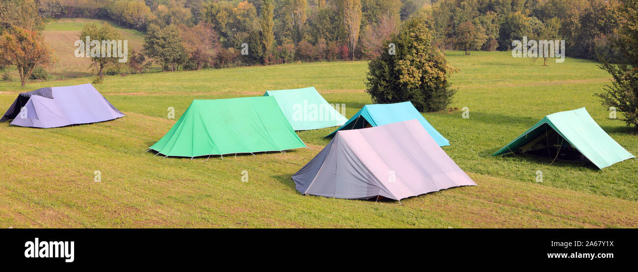 camping with many big tents on the meadow in autumn Stock Photo - Alamy