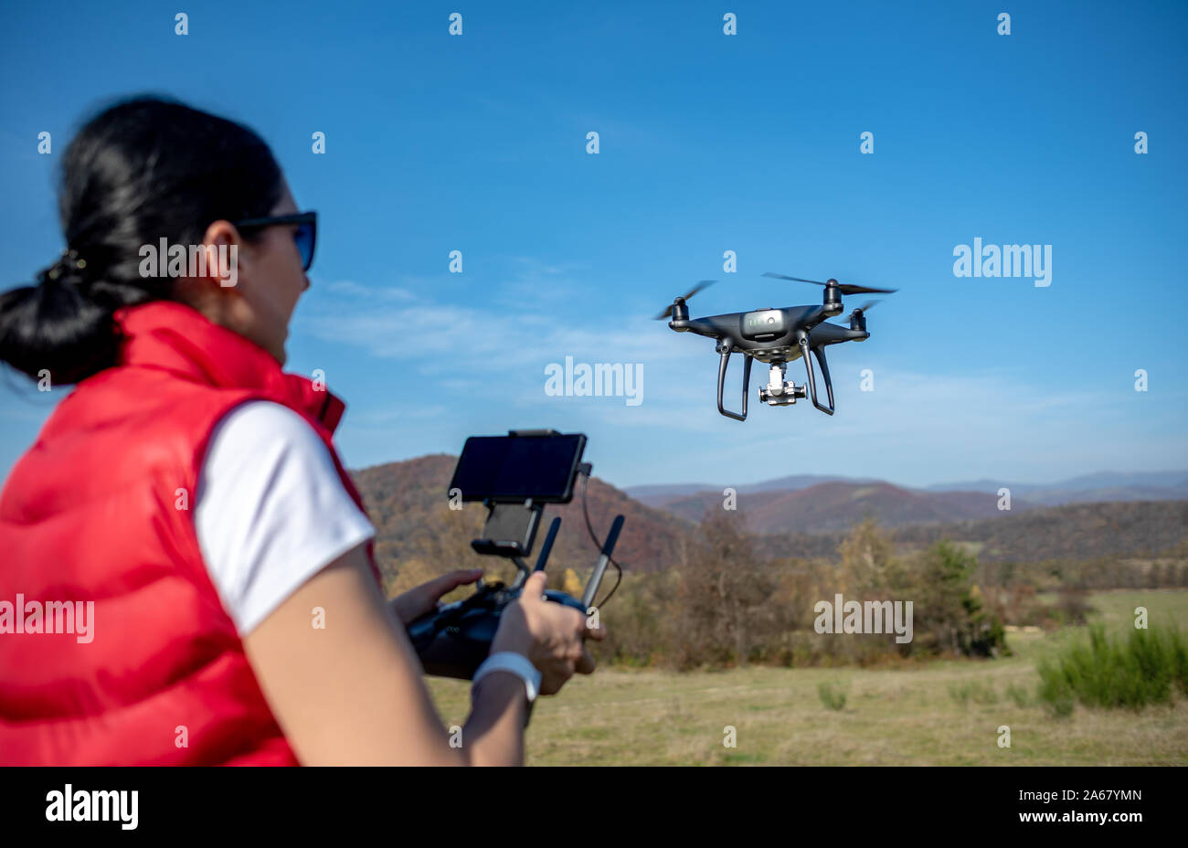 Female drone pilot hi-res stock photography and images - Alamy