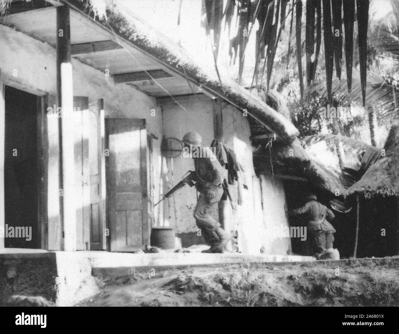 Low angle shot of armed american servicemen hi-res stock photography ...