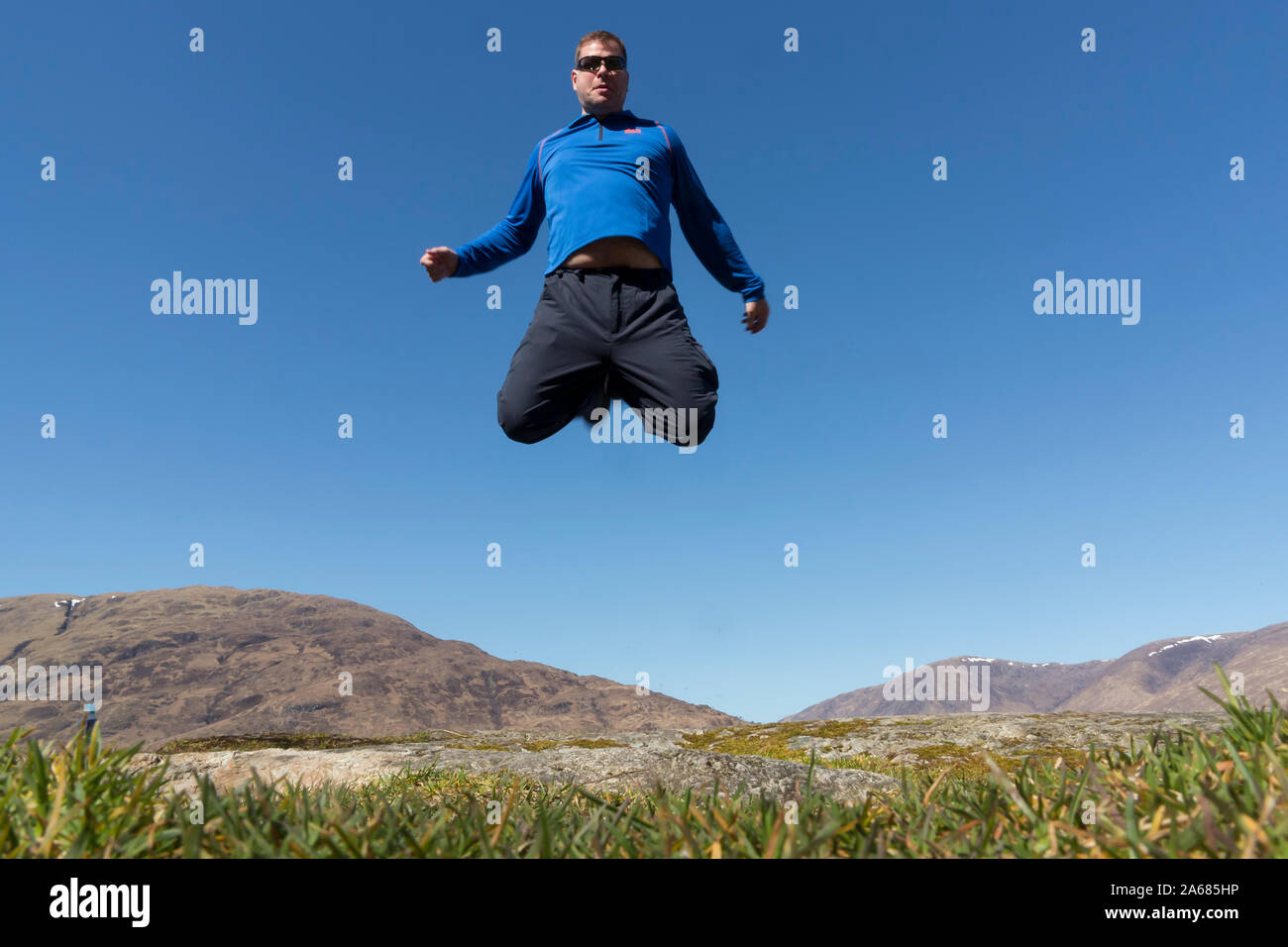 man jumping in the air Stock Photo - Alamy