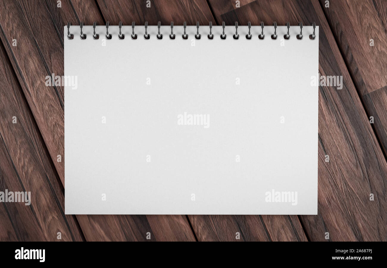 Blank ring bound scrap book on a rustic wooden background in horizontal ...