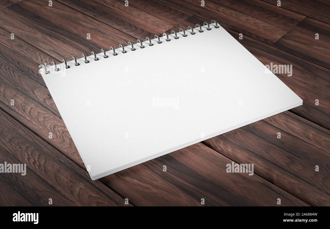 Blank ring bound scrap book on a rustic wooden background in horizontal ...