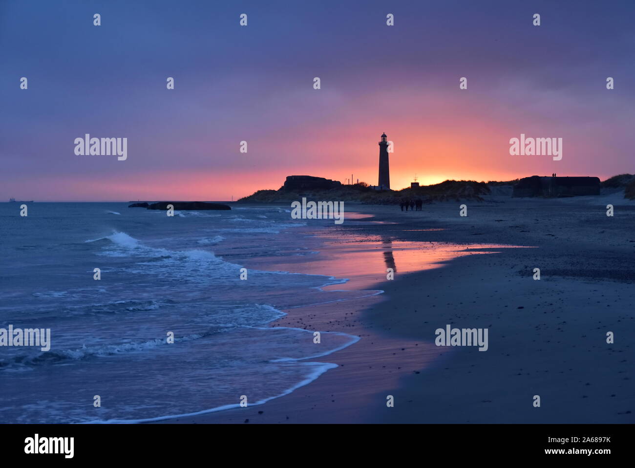 Sunset at the grey lighthouse in Skagen in Denmark Stock Photo - Alamy
