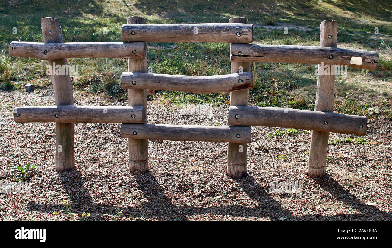 wooden fence built of large round logs on a sunny day Stock Photo - Alamy