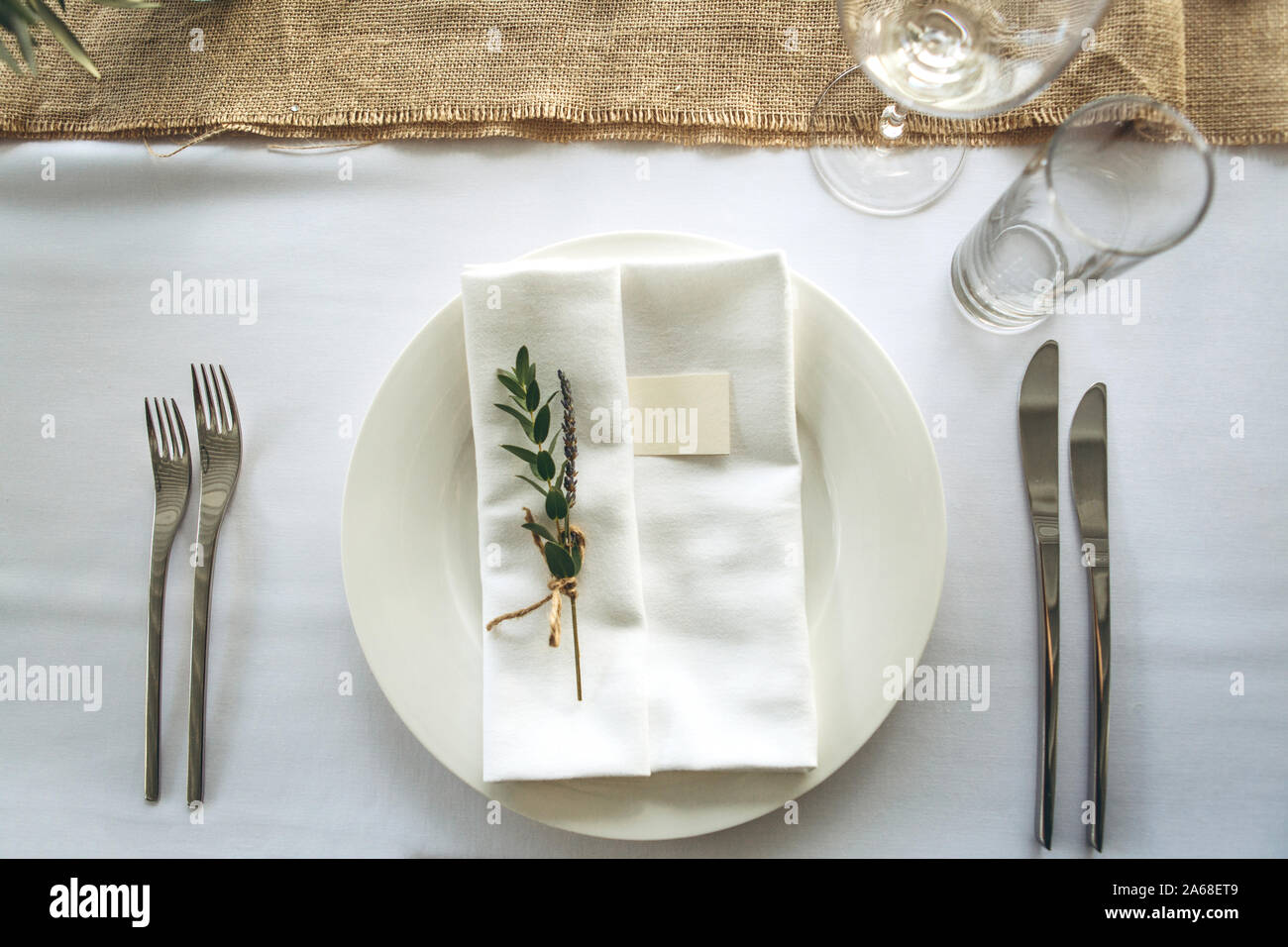 Plate, fork and knife. Table setting for a festive event Stock Photo ...