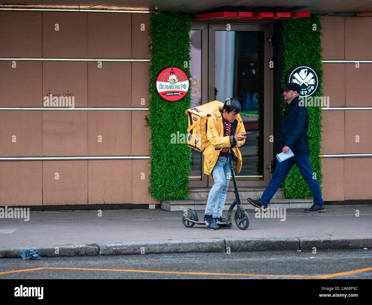 Moscow, Russia - October 19, 2019: Asian young man, a Yandex-Eda ...