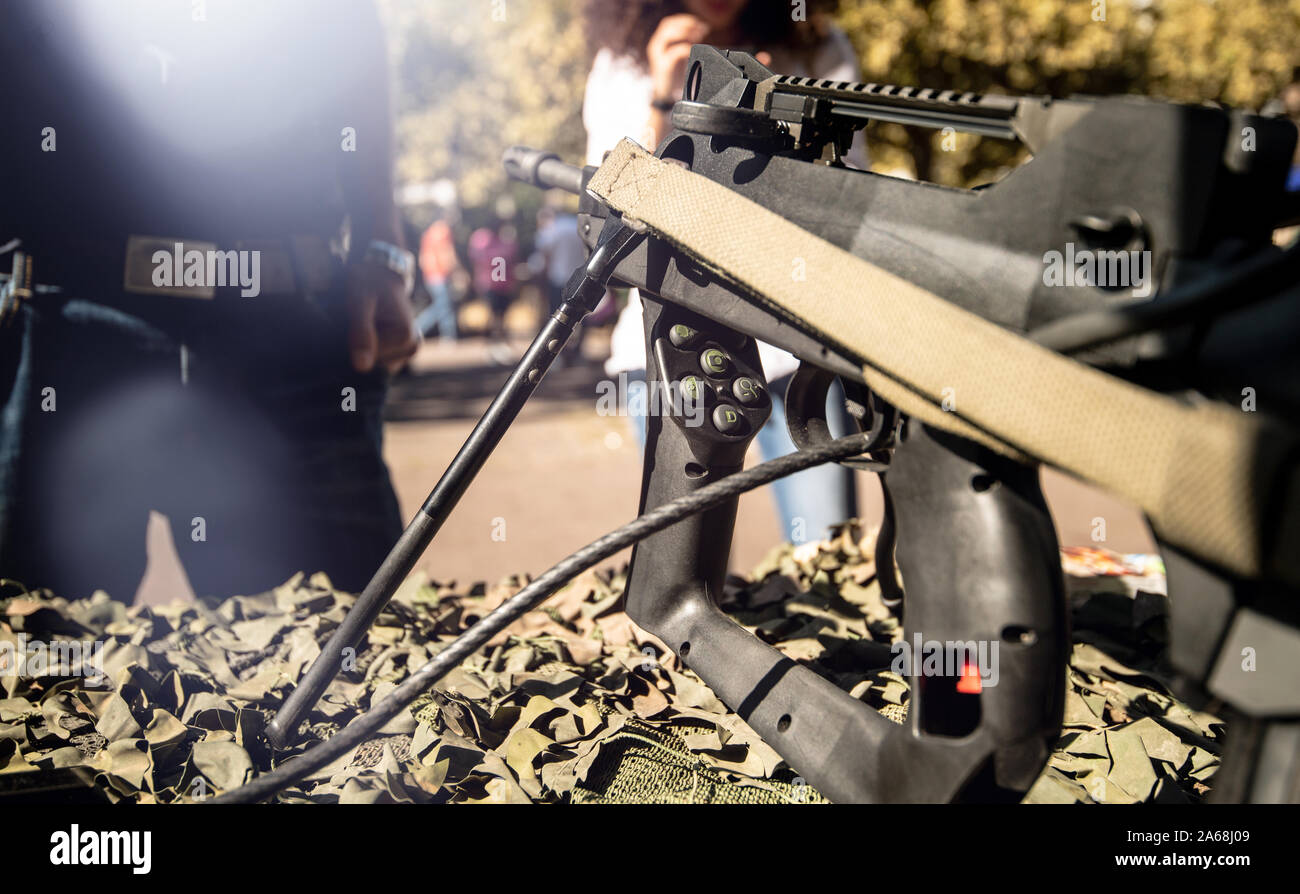 Details of the buttons on semi-automatic rifle allowing the shooter to ...