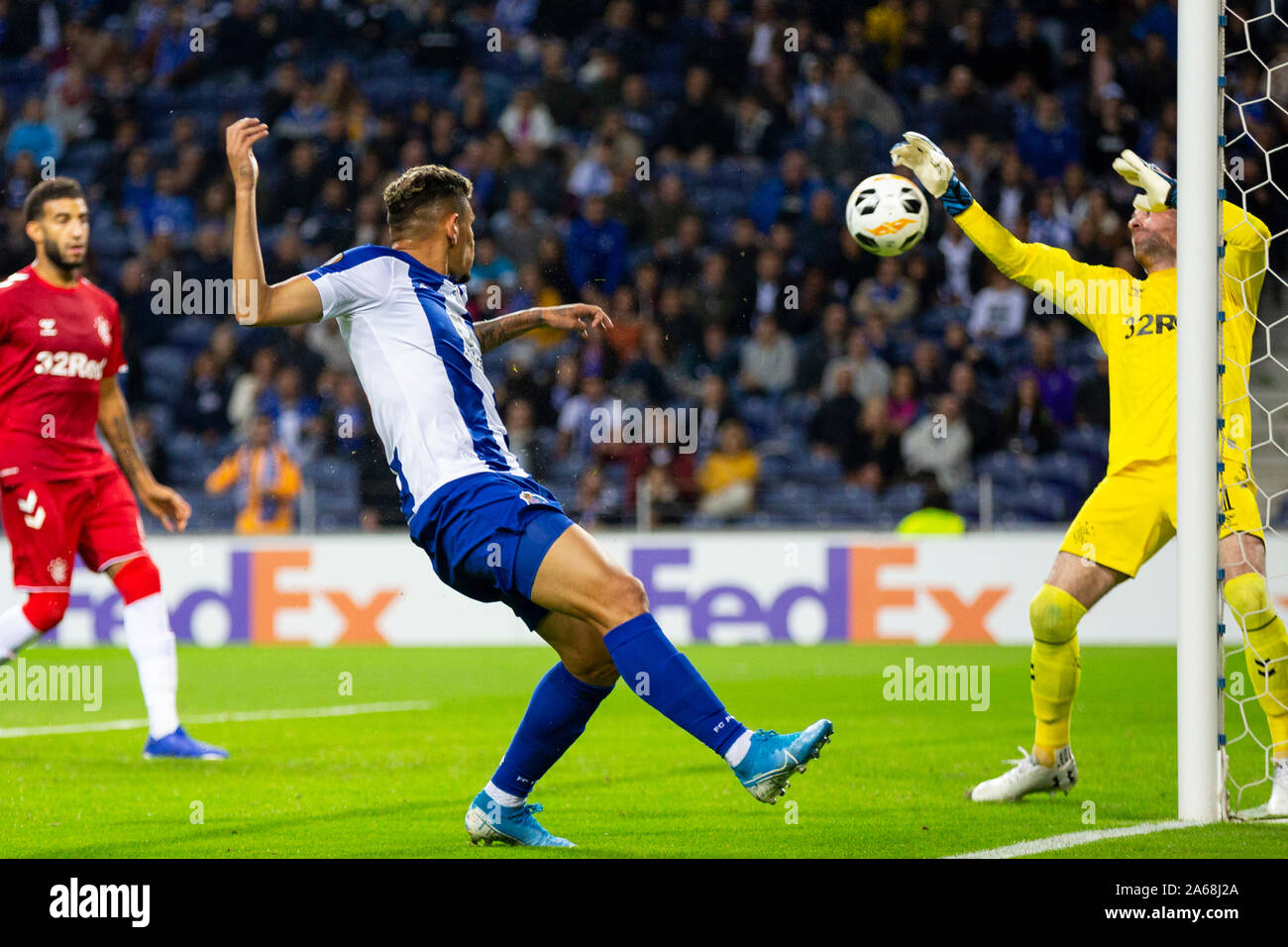 FC Porto's player Francisco Soares (L) and Ranger's goalkeeper Allan ...