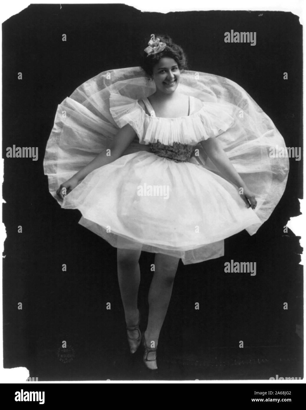 Woman posed, full-length, standing, facing front, wearing ballet ...