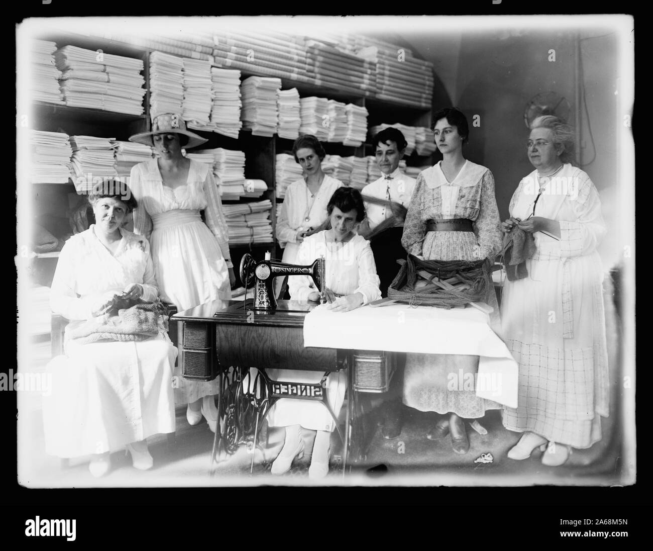 Women performing textile work Stock Photo - Alamy