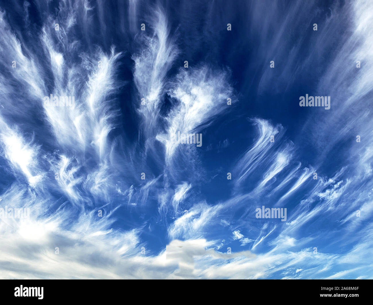 Creative Sky cirrus clouds Stock Photo - Alamy