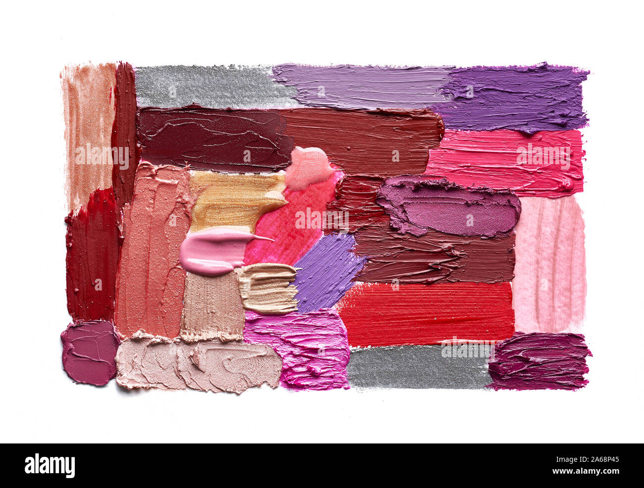 Texture of different lipsticks in fashionable shades or strokes of ...