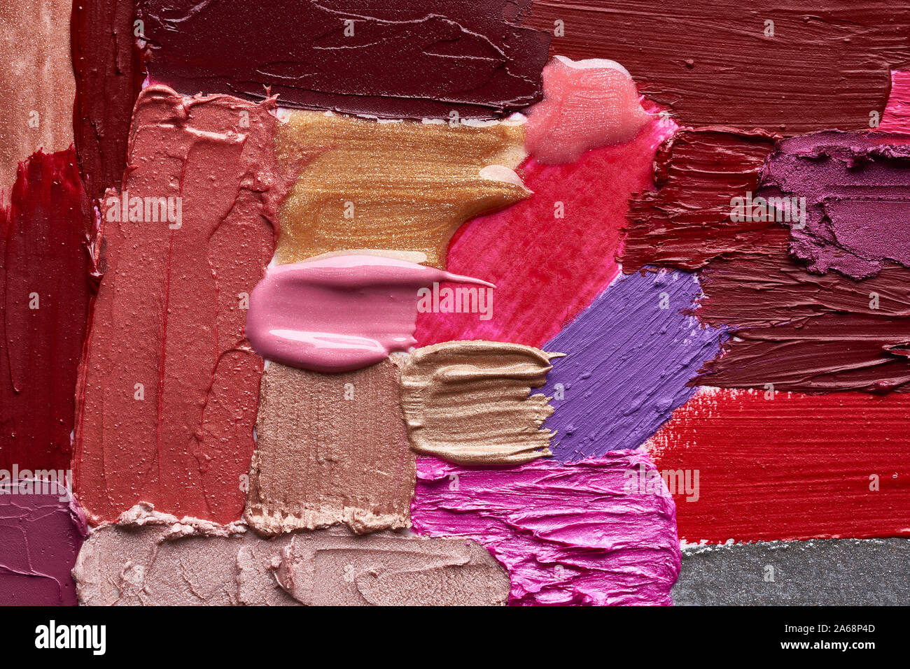 Texture of different lipsticks in fashionable shades or strokes of ...