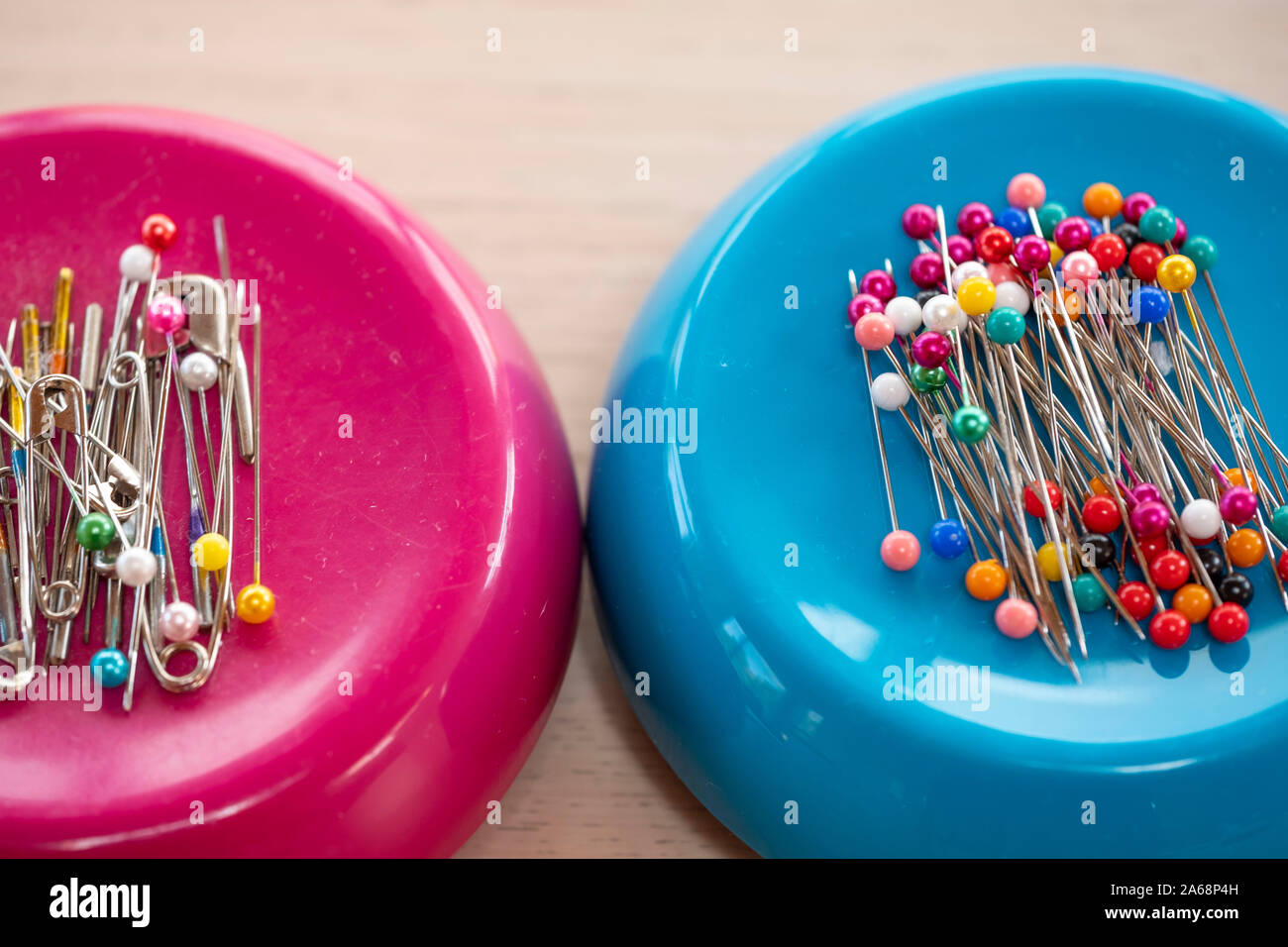 Dress making pins on a magnet Stock Photo - Alamy