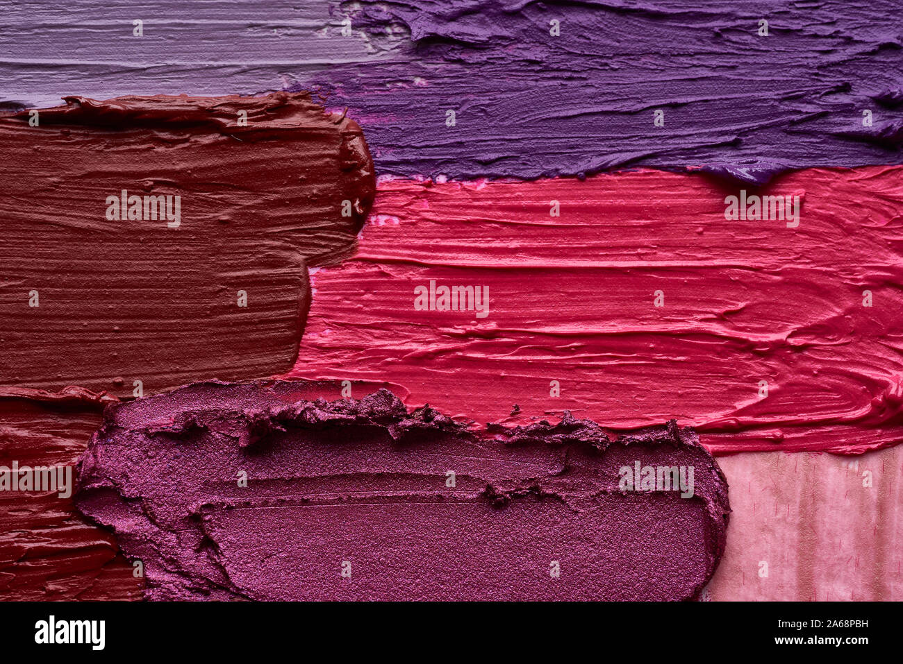 Texture of different lipsticks in fashionable shades or strokes of ...