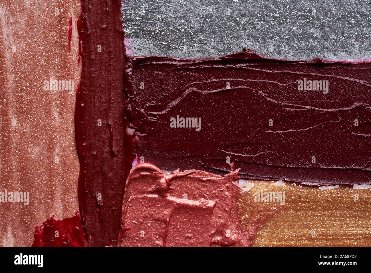 Texture of different lipsticks in fashionable shades or strokes of ...