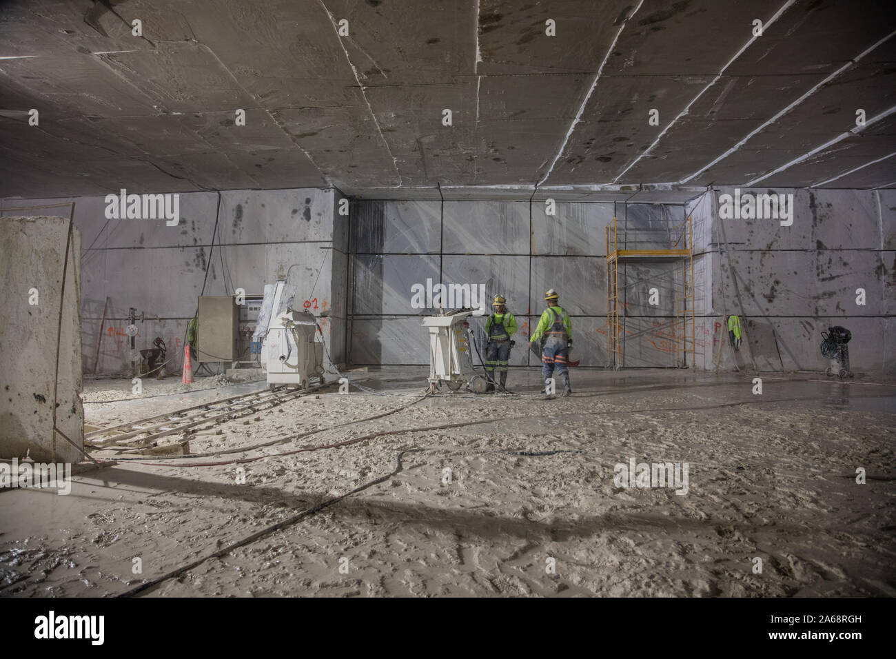 Work progresses inside the Colorado Stone Quarries mine high above the ...