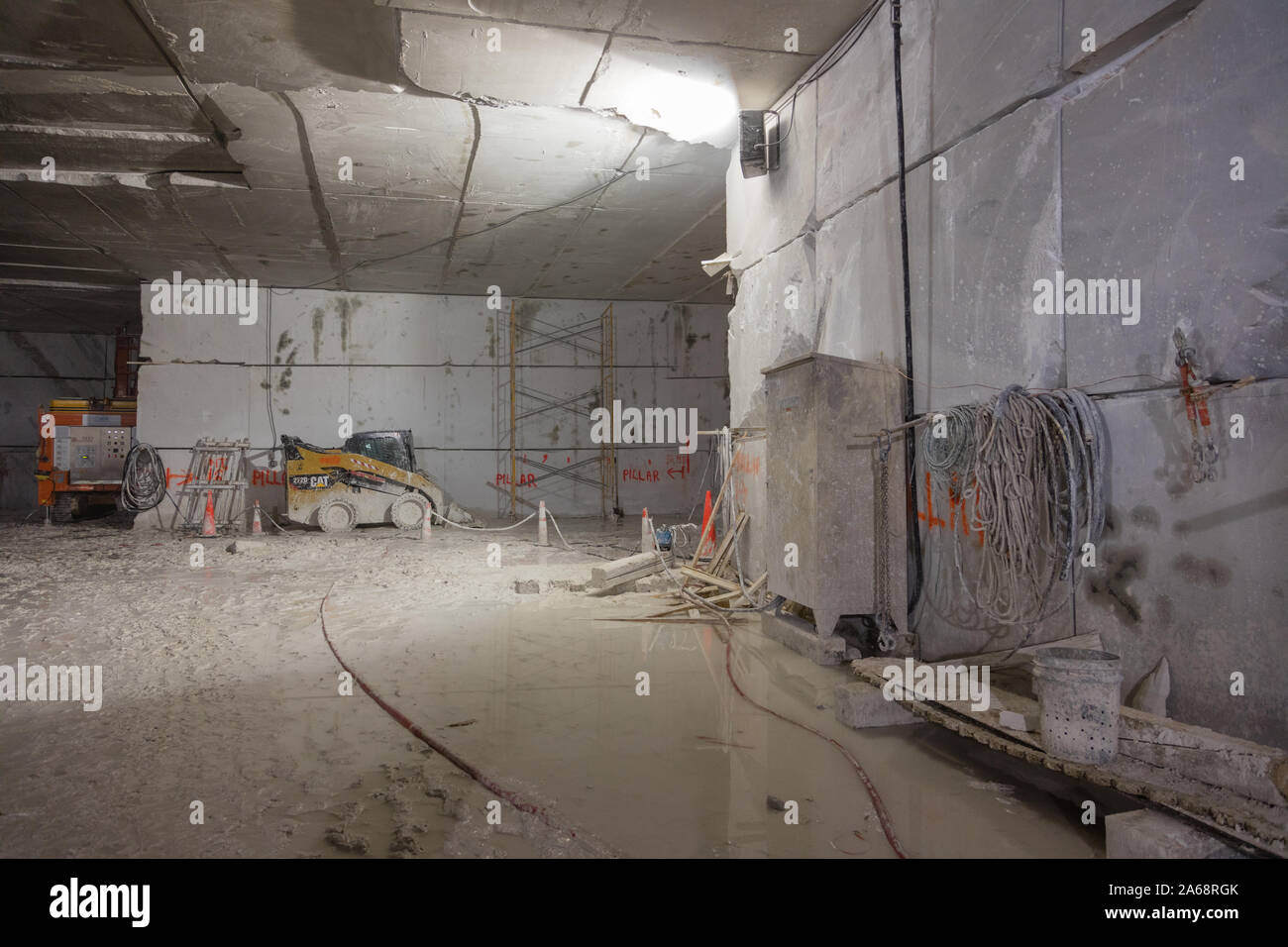 Work progresses inside the Colorado Stone Quarries mine high above the ...