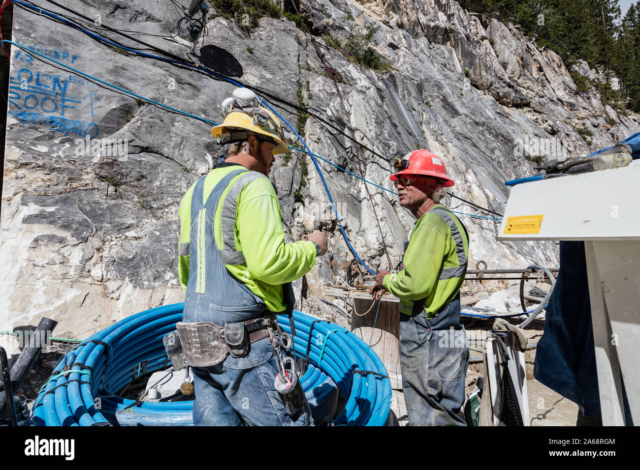 Work progresses inside the Colorado Stone Quarries mine high above the ...