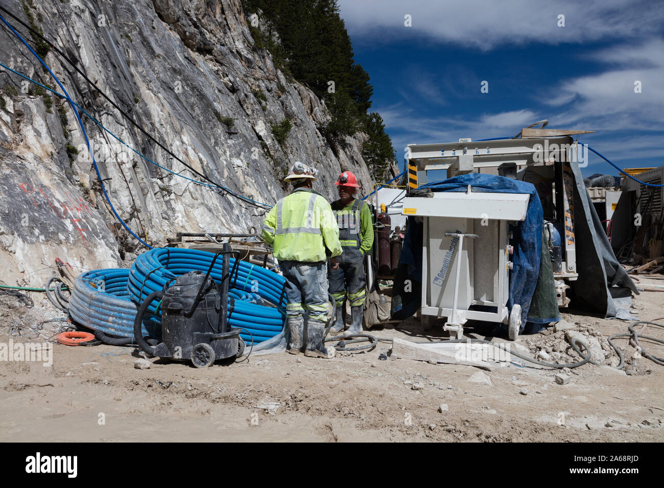 Work progresses inside the Colorado Stone Quarries mine high above the ...