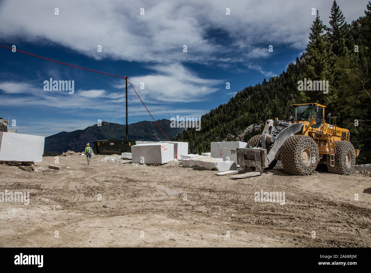 Work progresses inside the Colorado Stone Quarries mine high above the ...