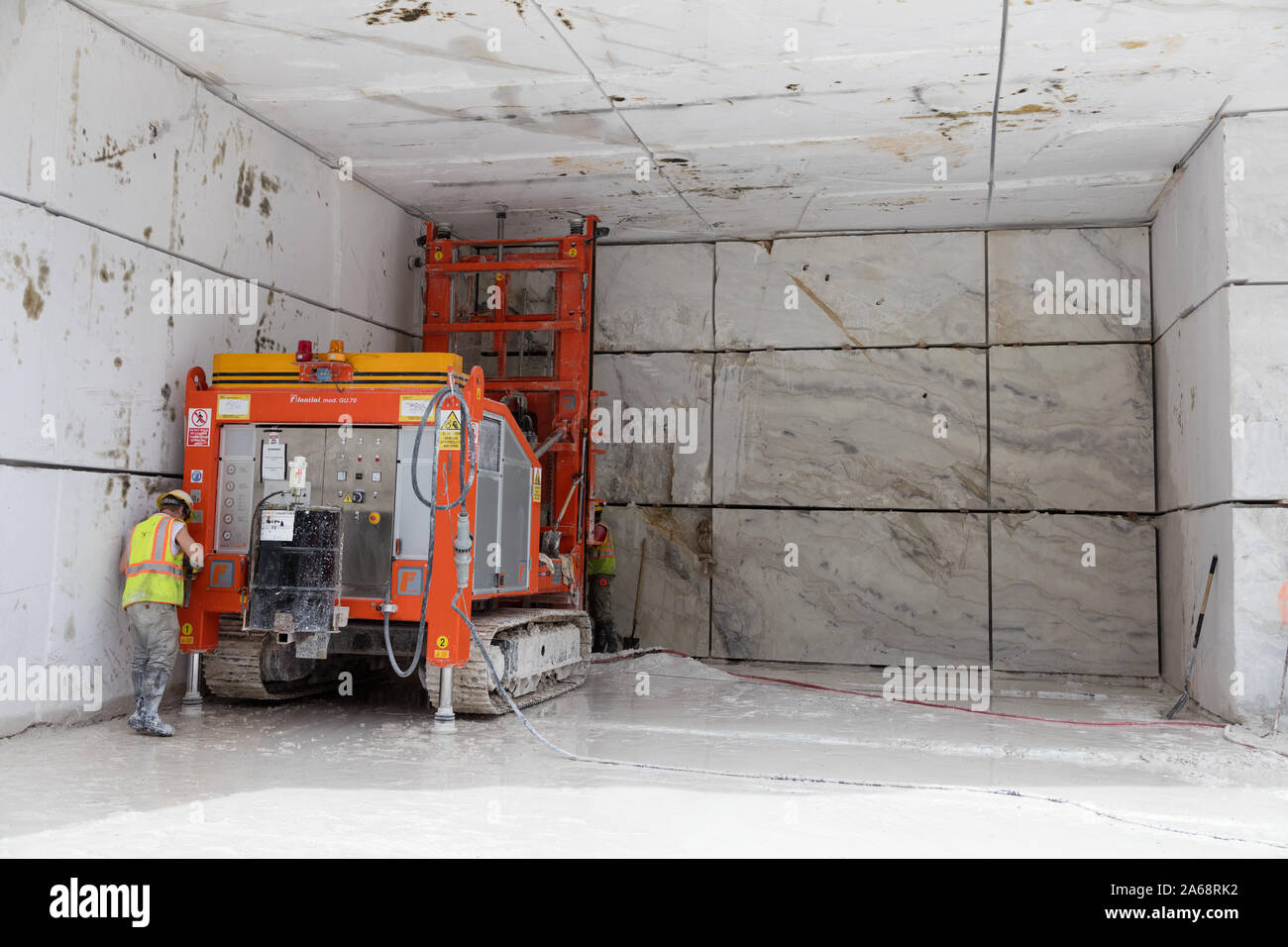 Work progresses inside the Colorado Stone Quarries mine high above the ...