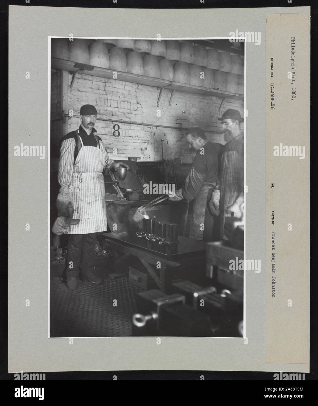 Workers in the smelting room of the United States mint in Philadelphia ...
