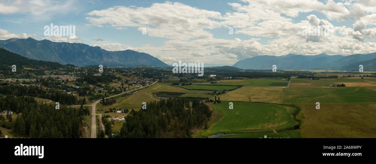 Aerial Panoramic View of Small Town, Creston, during a sunny and cloudy ...