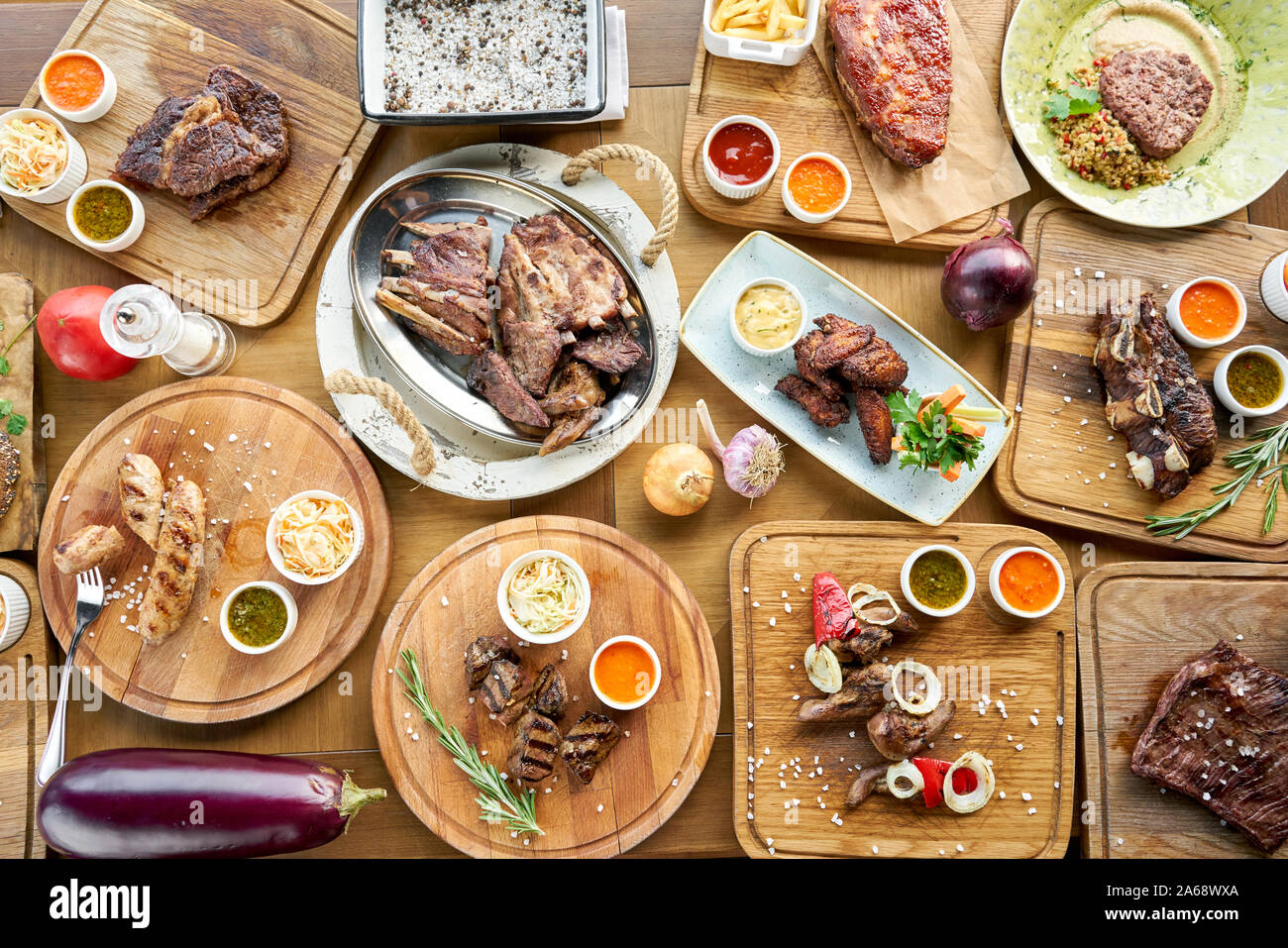 Barbecue restaurant menu. Many different food on the table. Dinner ...