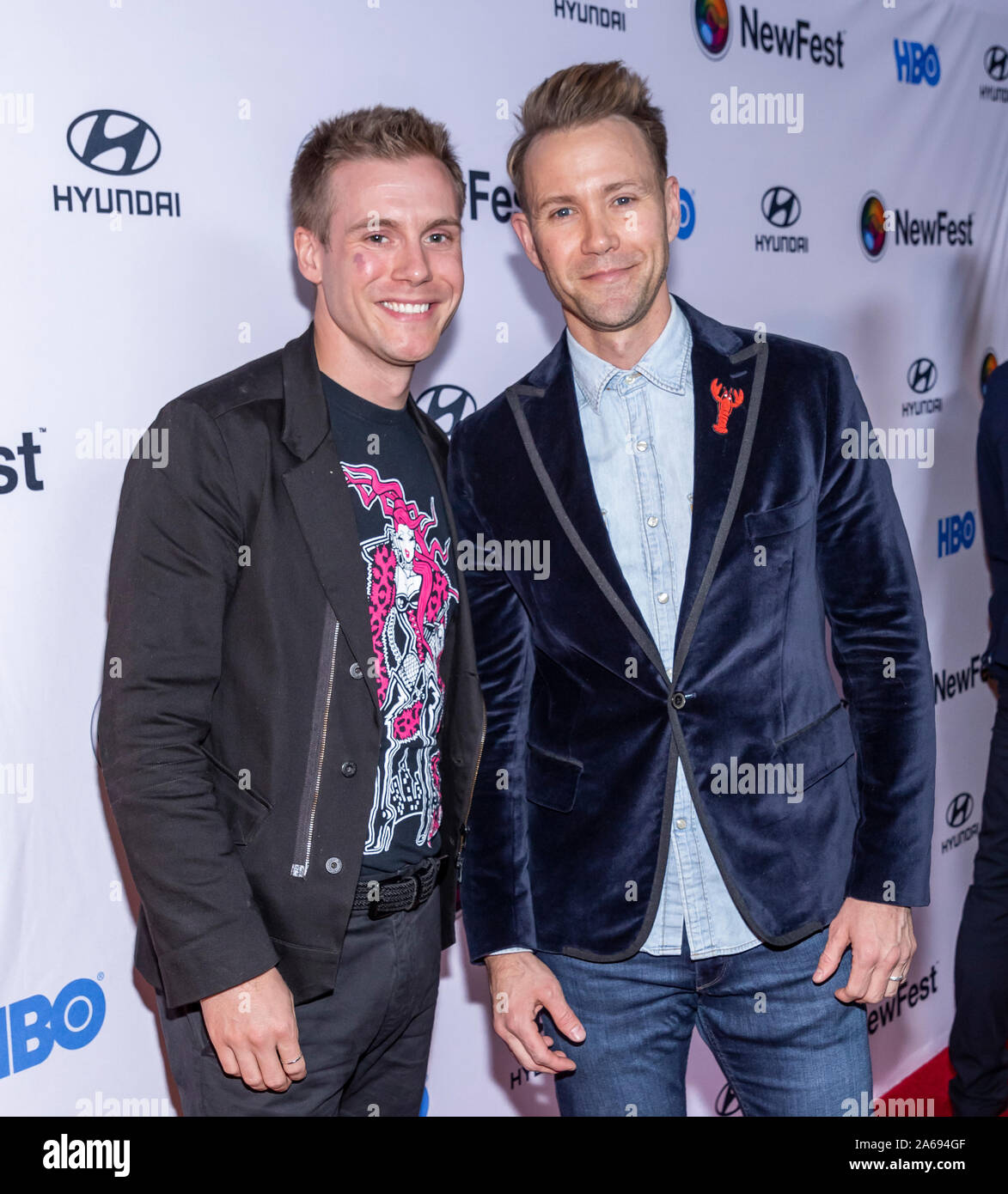 New York, NY, USA - October 23, 2019: Zachary Booth and Christopher Hanke attend the opening ...