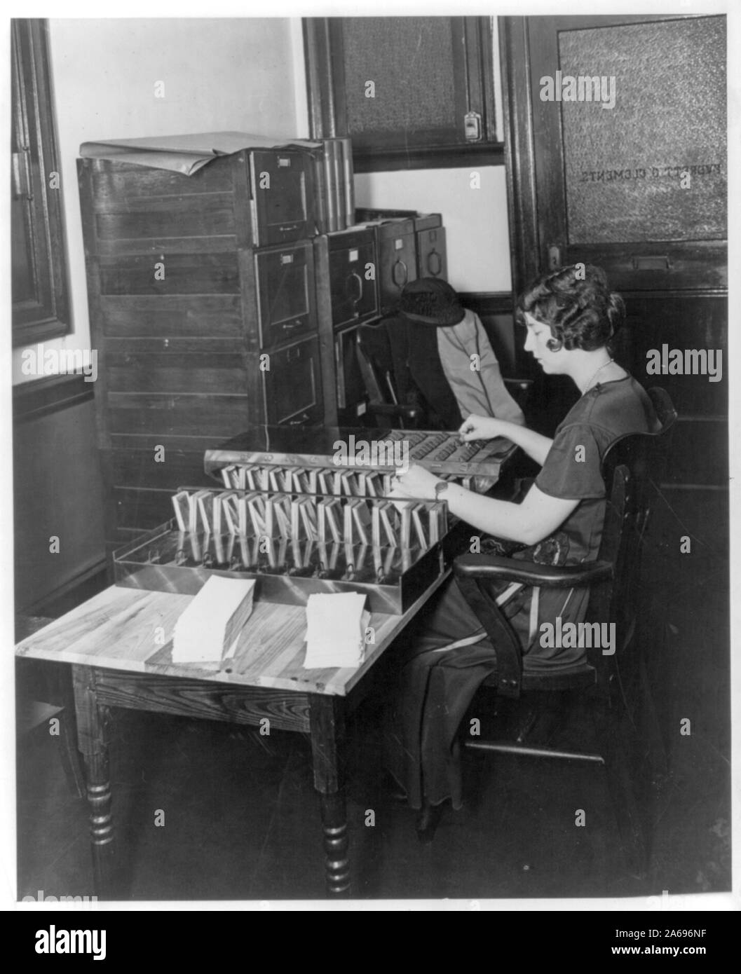 Sorting staff Black and White Stock Photos & Images - Alamy