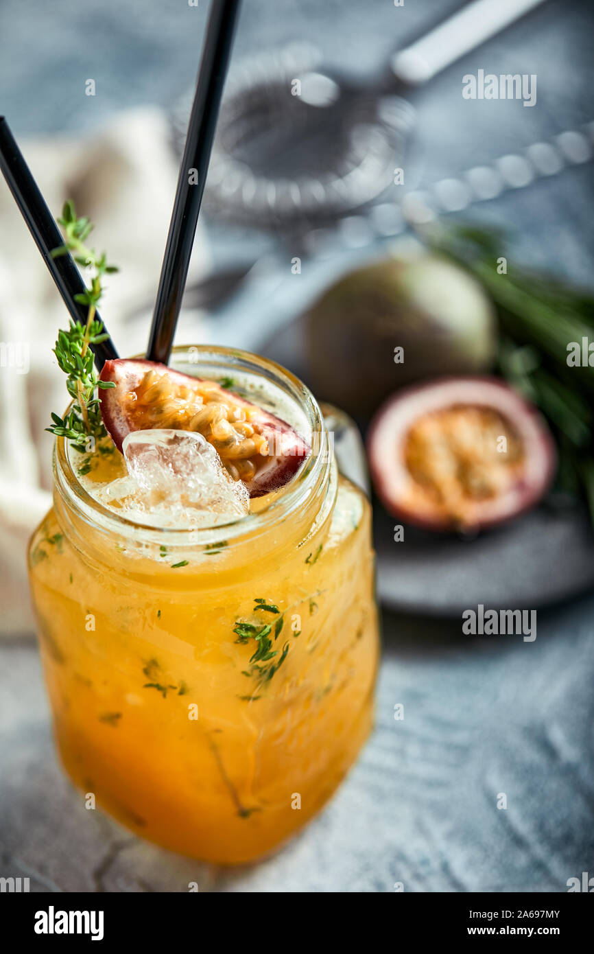 Fresh tropical cocktail with orange, peach and passion fruit Stock ...