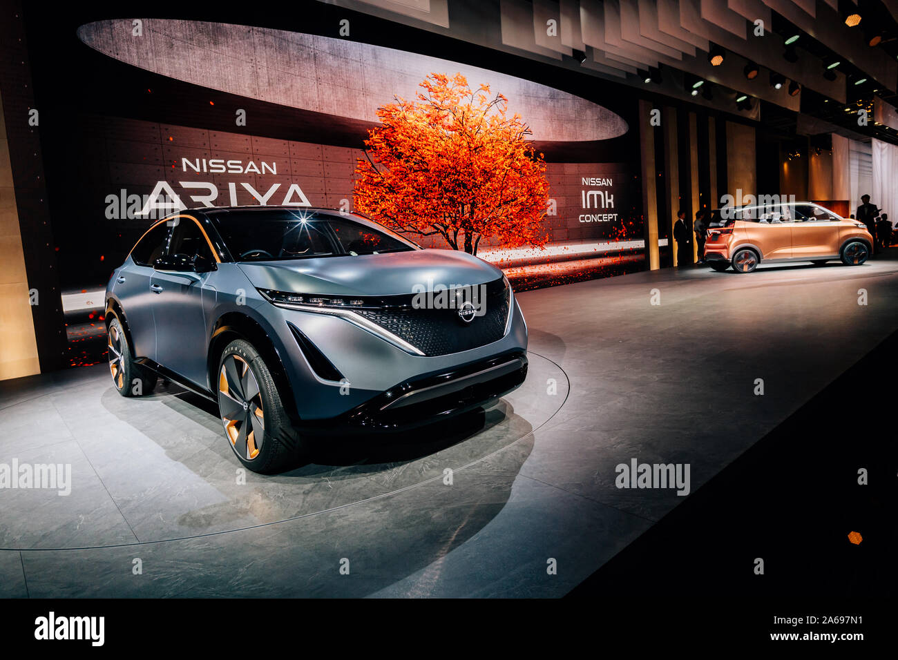 The Nissan ARIYA Concept (L) and the Nissan IMk Concept (R) on display ...