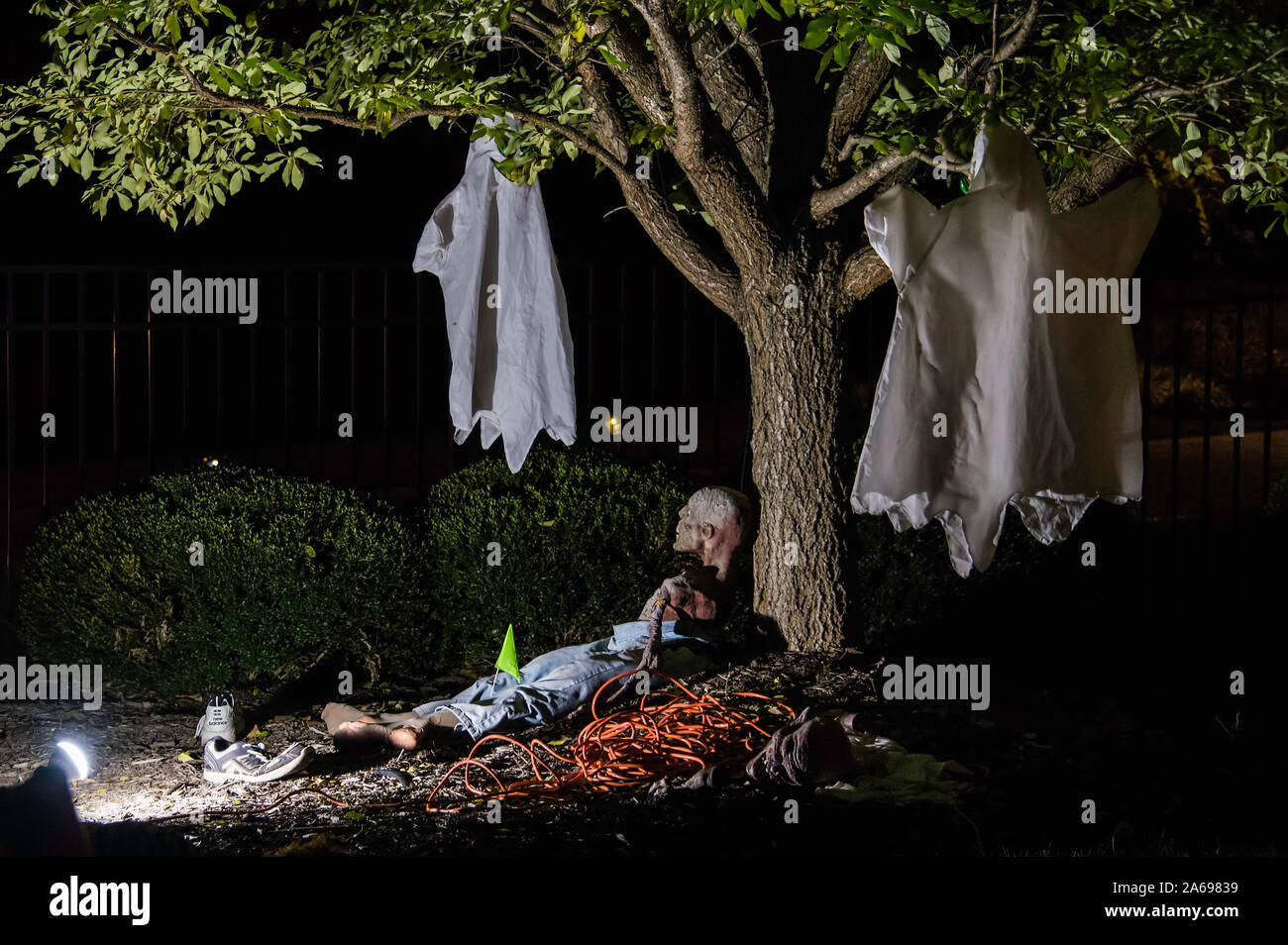 Suburban Halloween decorations at night Stock Photo - Alamy