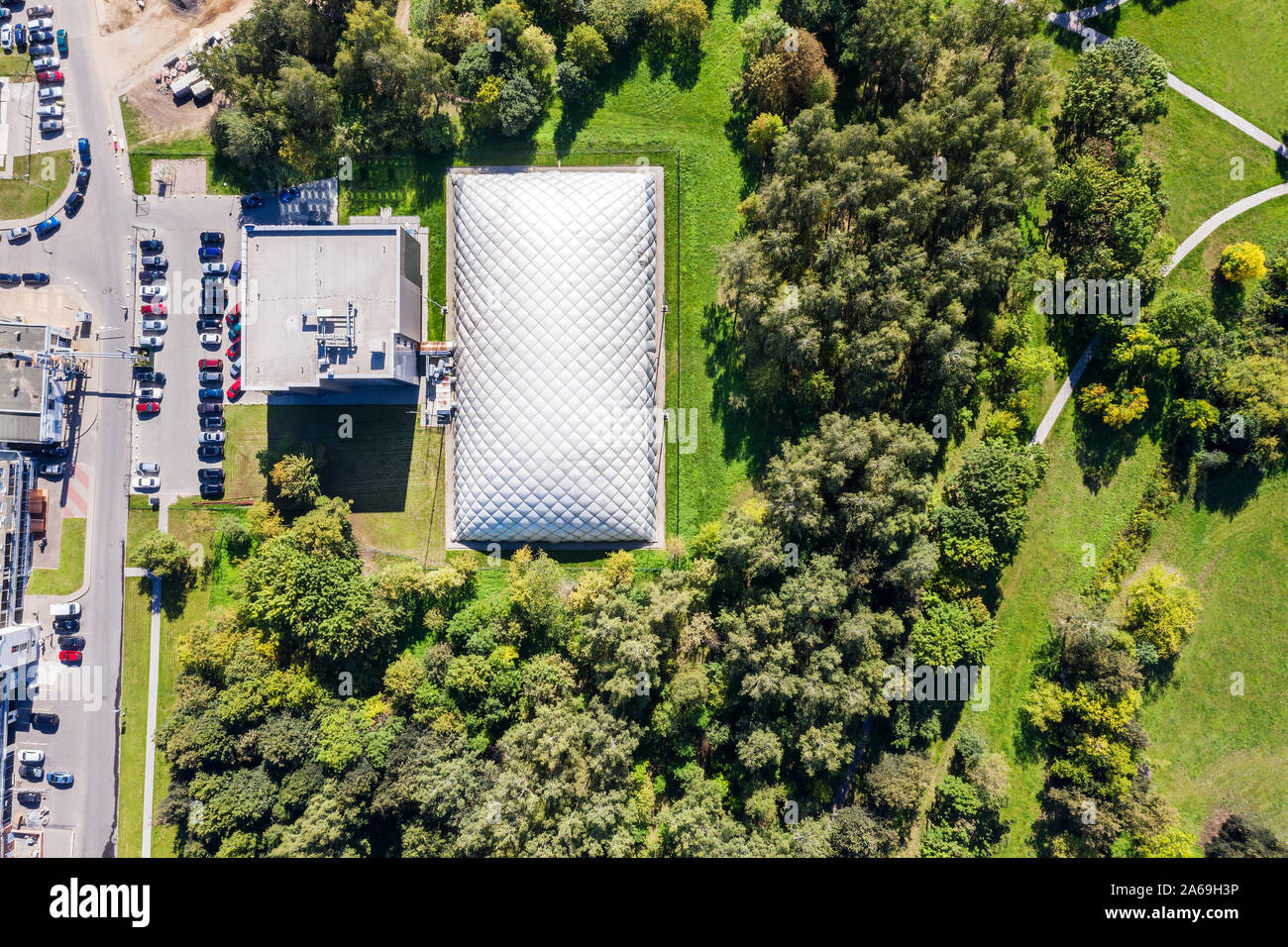 top view aerial photo from flying drone of modern sports center in park ...
